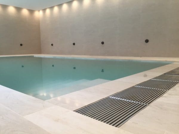 New build swimming pool with metal overflow | Brookforge Swimming Pool ...